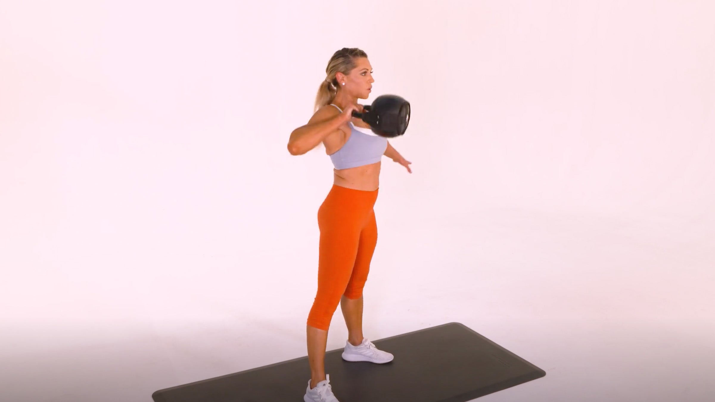 Kettlebell One-Arm Punch Swing | Oxygen Mag